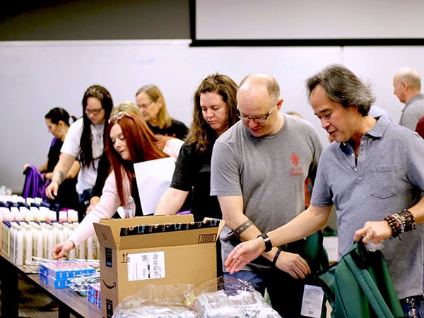 18 Companies That Make Giving Back Part of the Job